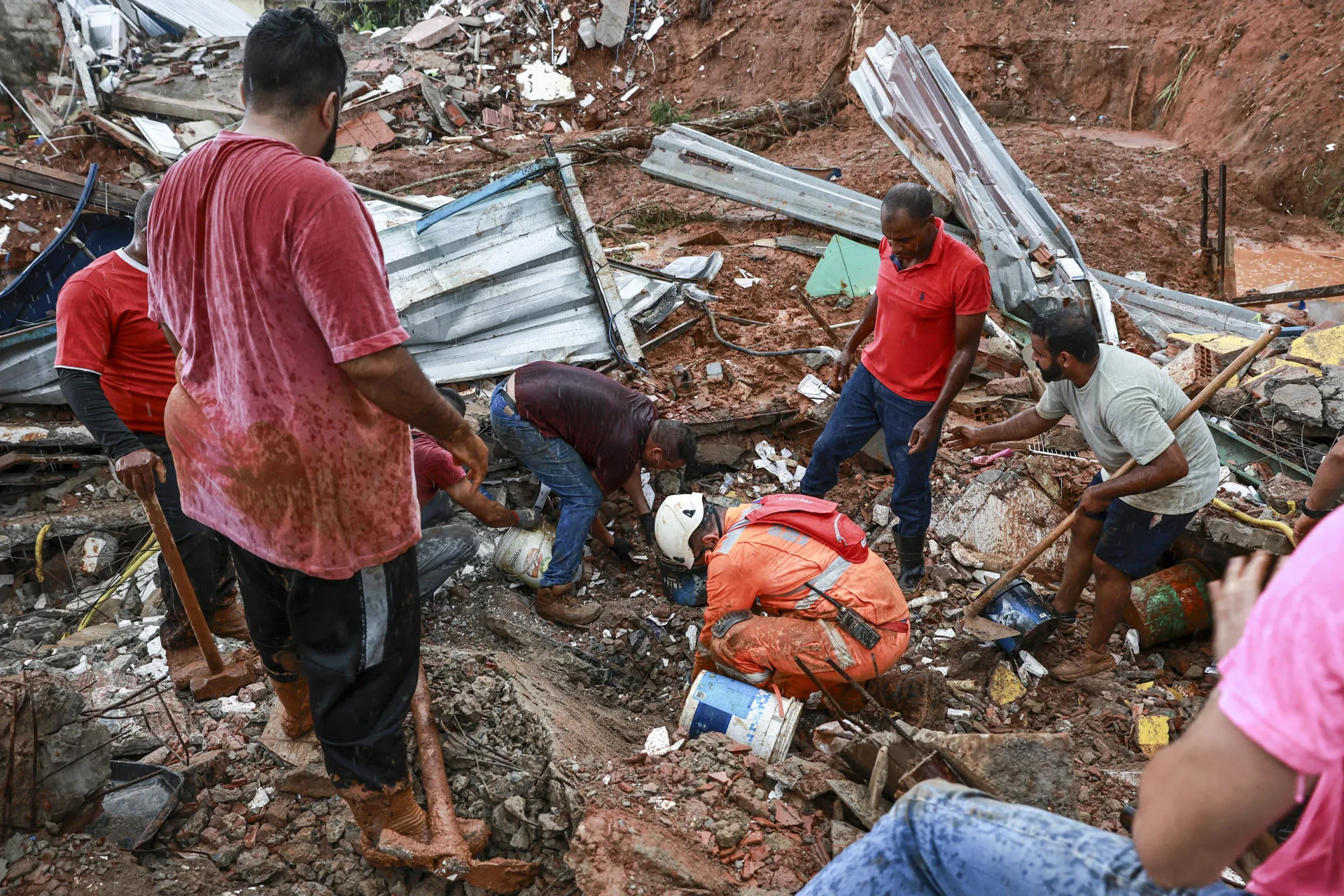 Strong storm leaves at least 28 people dead and dozens missing